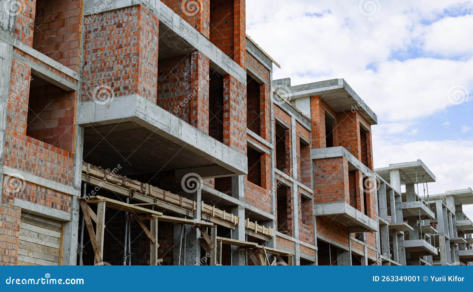 A Multi-storey Building Made of Monolithic and Red Brick Stock Image ...
