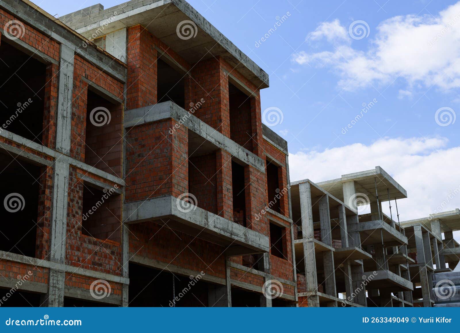 A Multi-storey Building Made of Monolithic and Red Brick Stock Image ...