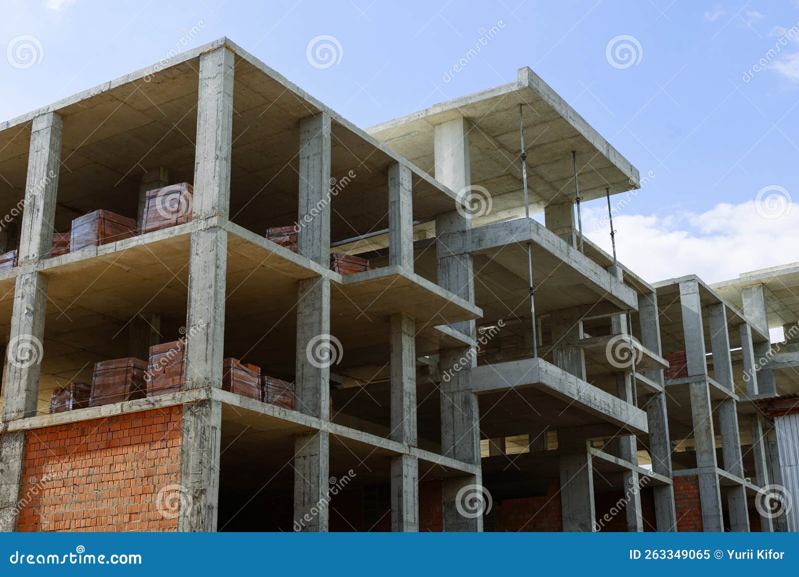 A Multi-storey Building Made of Monolithic and Red Brick Stock Image ...