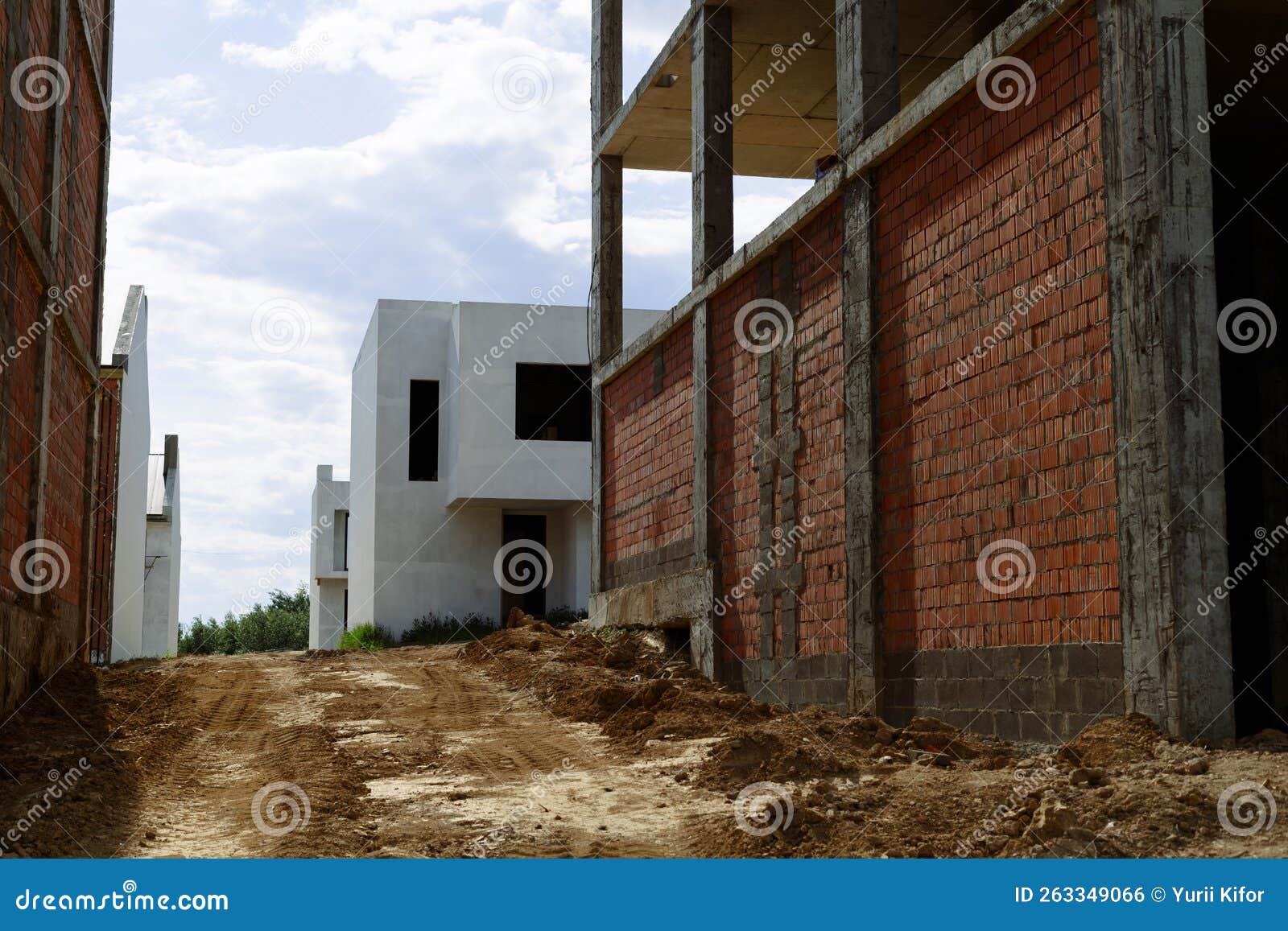 A Multi-storey Building Made of Monolithic and Red Brick Stock Photo ...