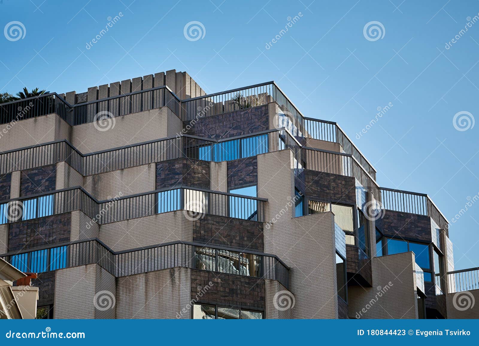 Multi-storey, Multi-faceted Building with a Beautiful Glass Balcony ...