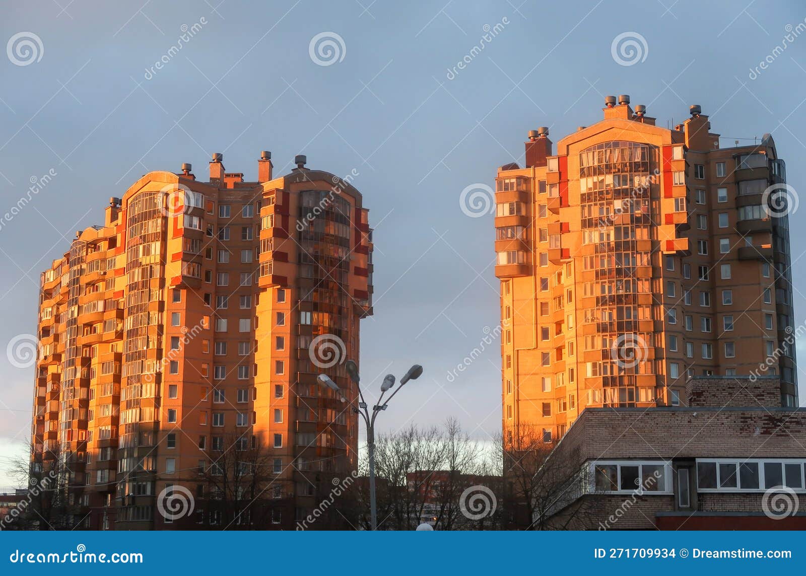 Multi-storey Residential Buildings Illuminated by the Sun Editorial ...