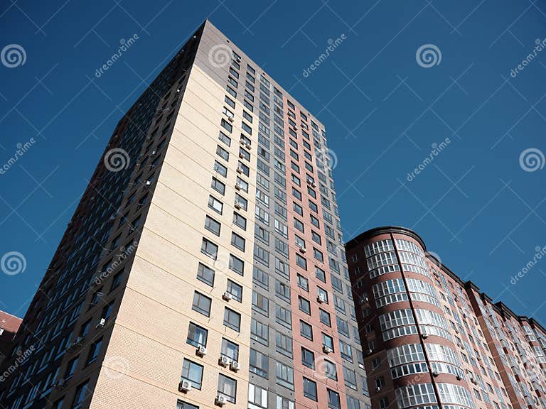 Multi-storey Residential Buildings in a New Complex Against a Clear Sky ...
