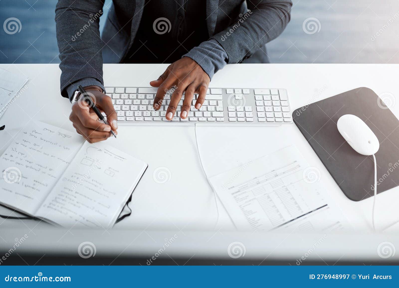 Multi-taskers Stay on Top of Work. High Angle Shot of a Businessman ...