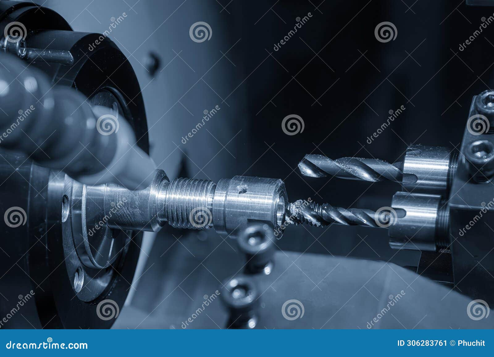 The Multi Tasking CNC Lathe Machine Swiss Type Tapping the Brass ...