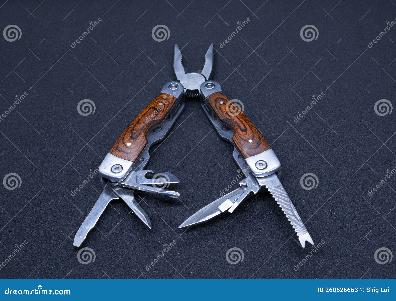 Multi Tool Tweezers Color Grey on Black Background Stock Image - Image ...