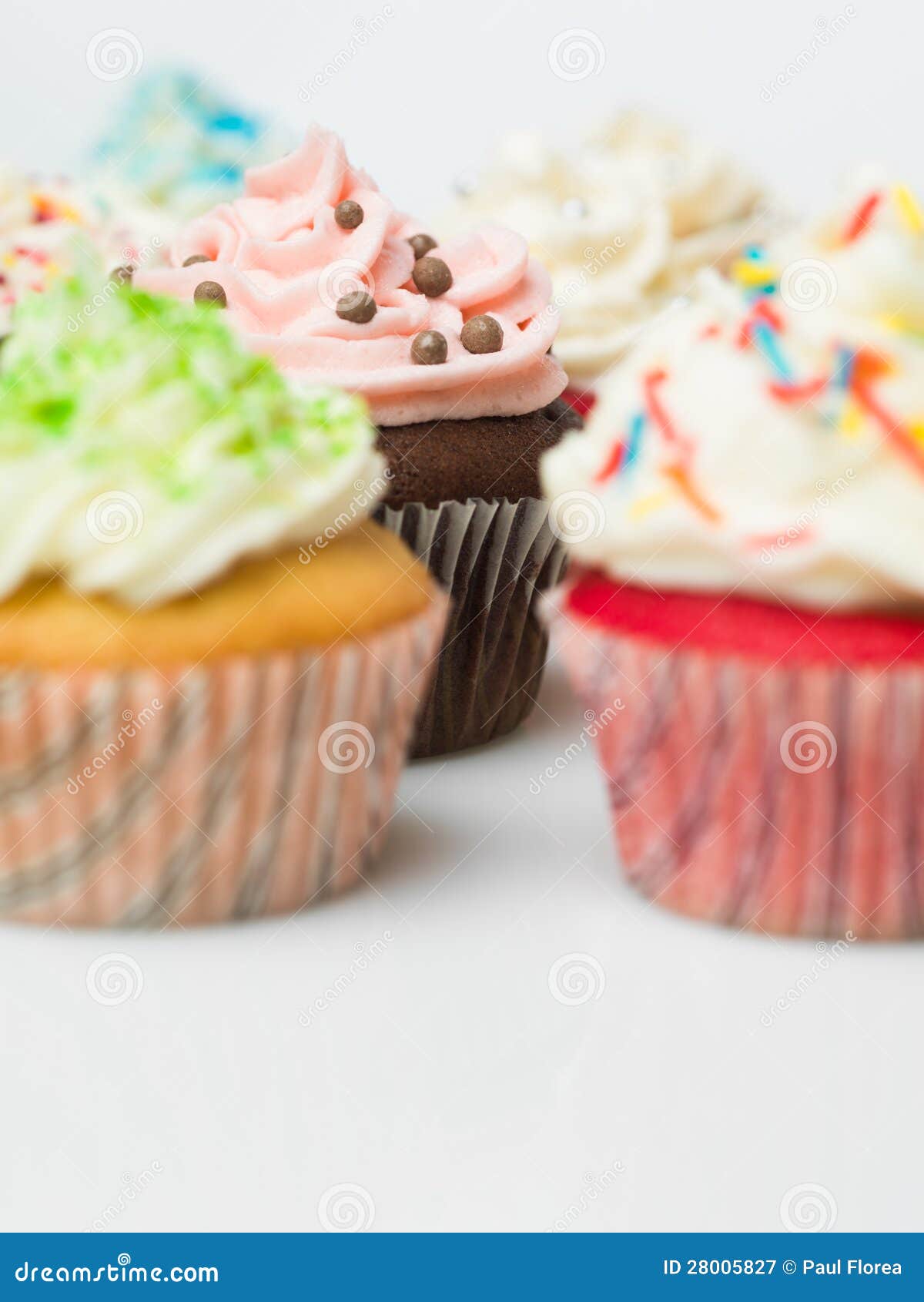 Multicolor cupcakes stock image. Image of isolated, multicolored - 28005827