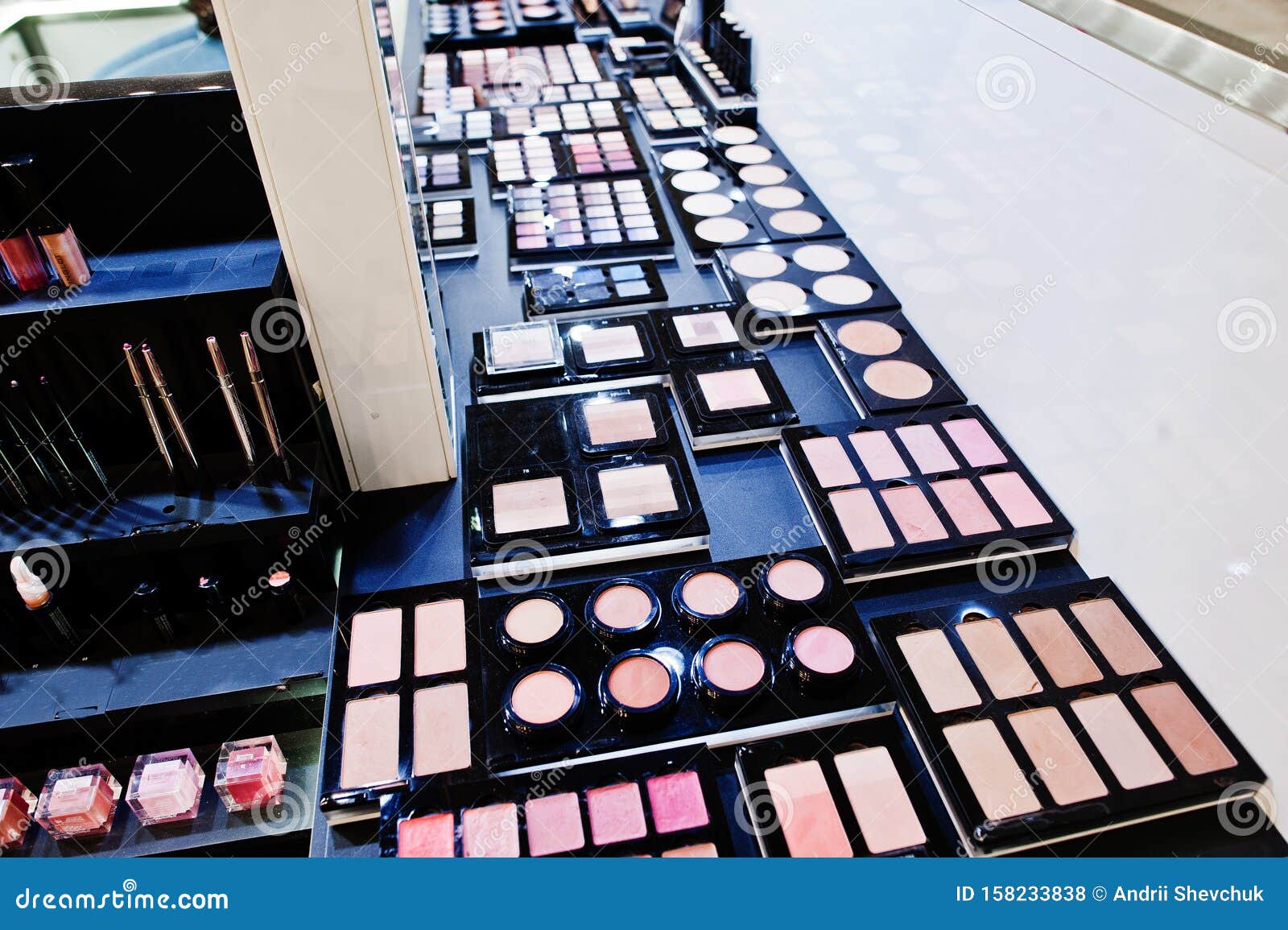 Multicolor Lipstick or Eye Shadow Makeup Pallette on Shelf in the Shop ...