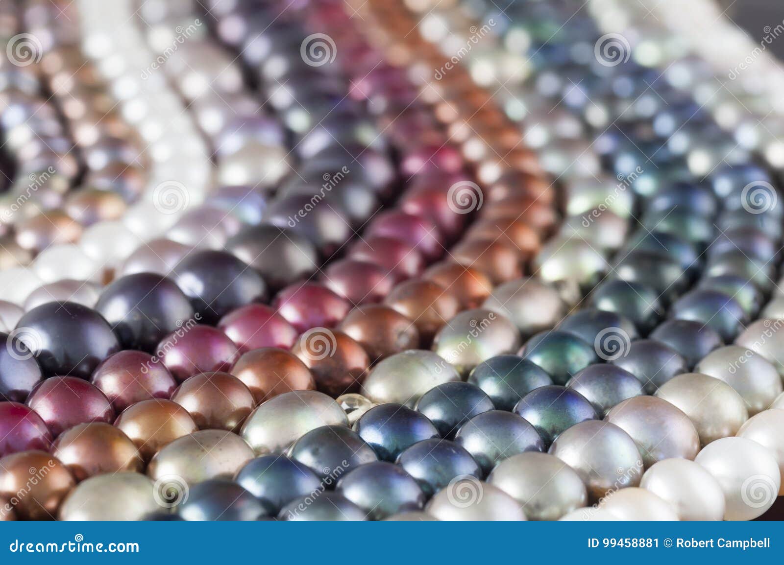 Multicolor Pearl Strands in Parallel Waves Backlit Composition Stock ...