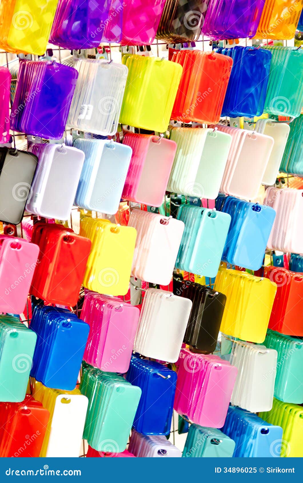 MultiColor Plastic Mobile Phone Cases on Hangers Stock Image - Image of ...