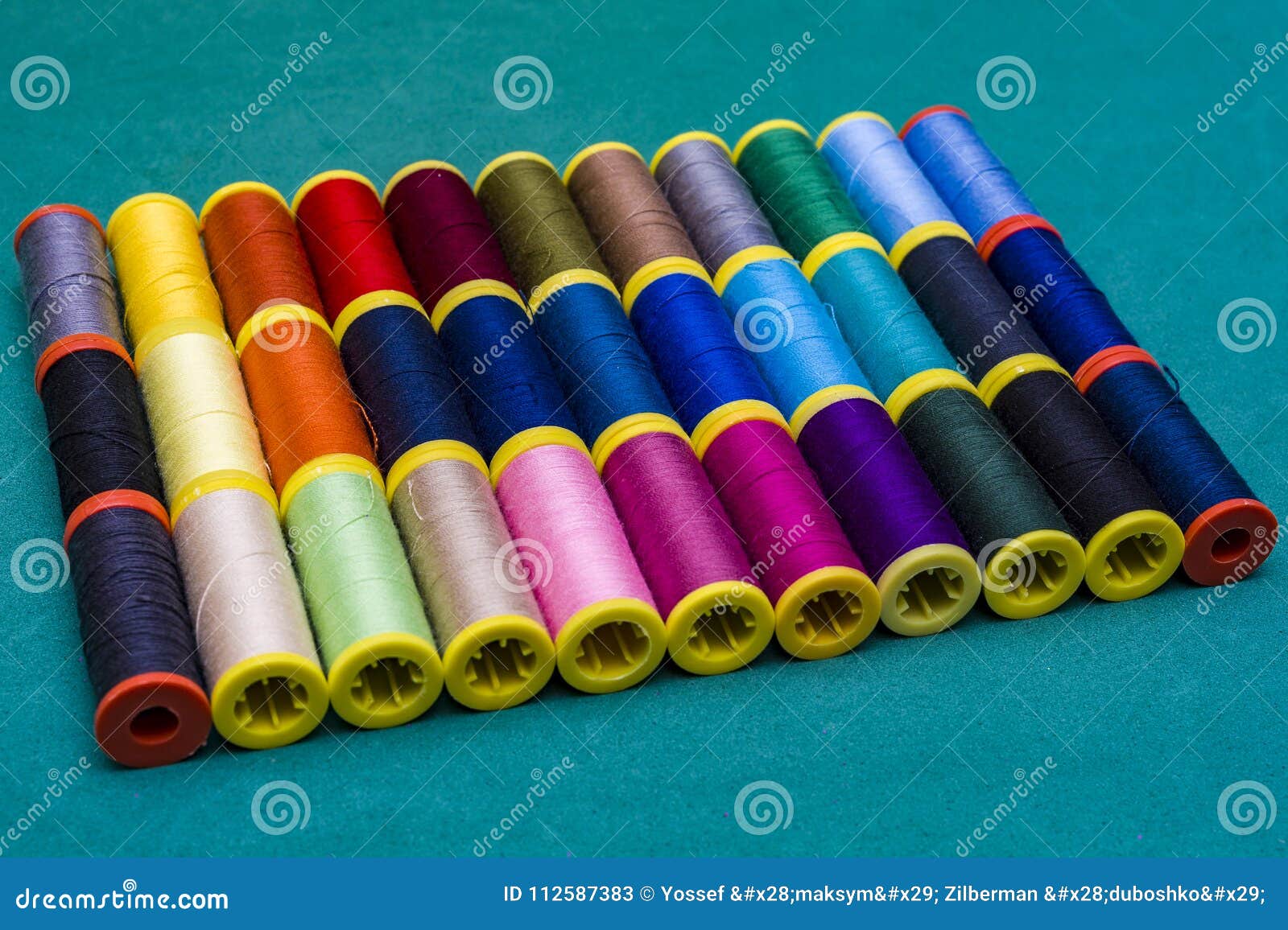 Multicolor Sewing Threads on Wooden Background Stock Image - Image of ...