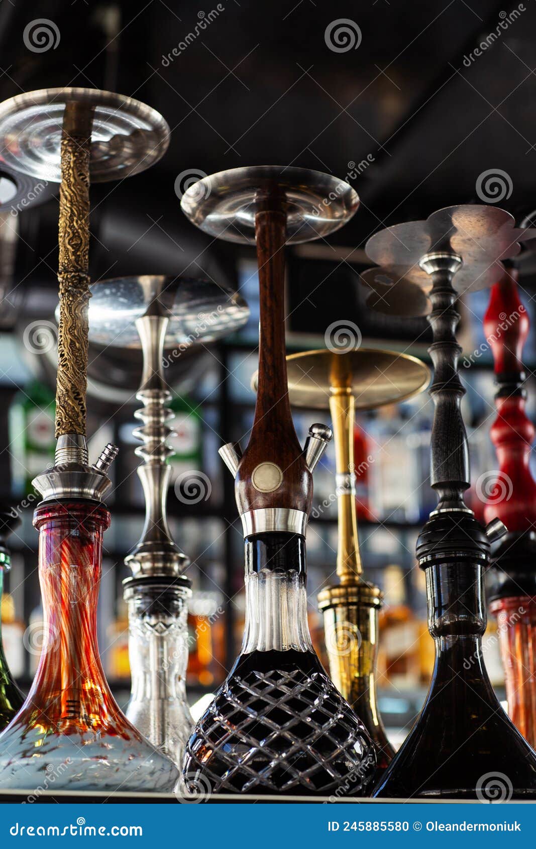 Multicolored Beautiful Hookahs Stand on the Table on the Background of ...