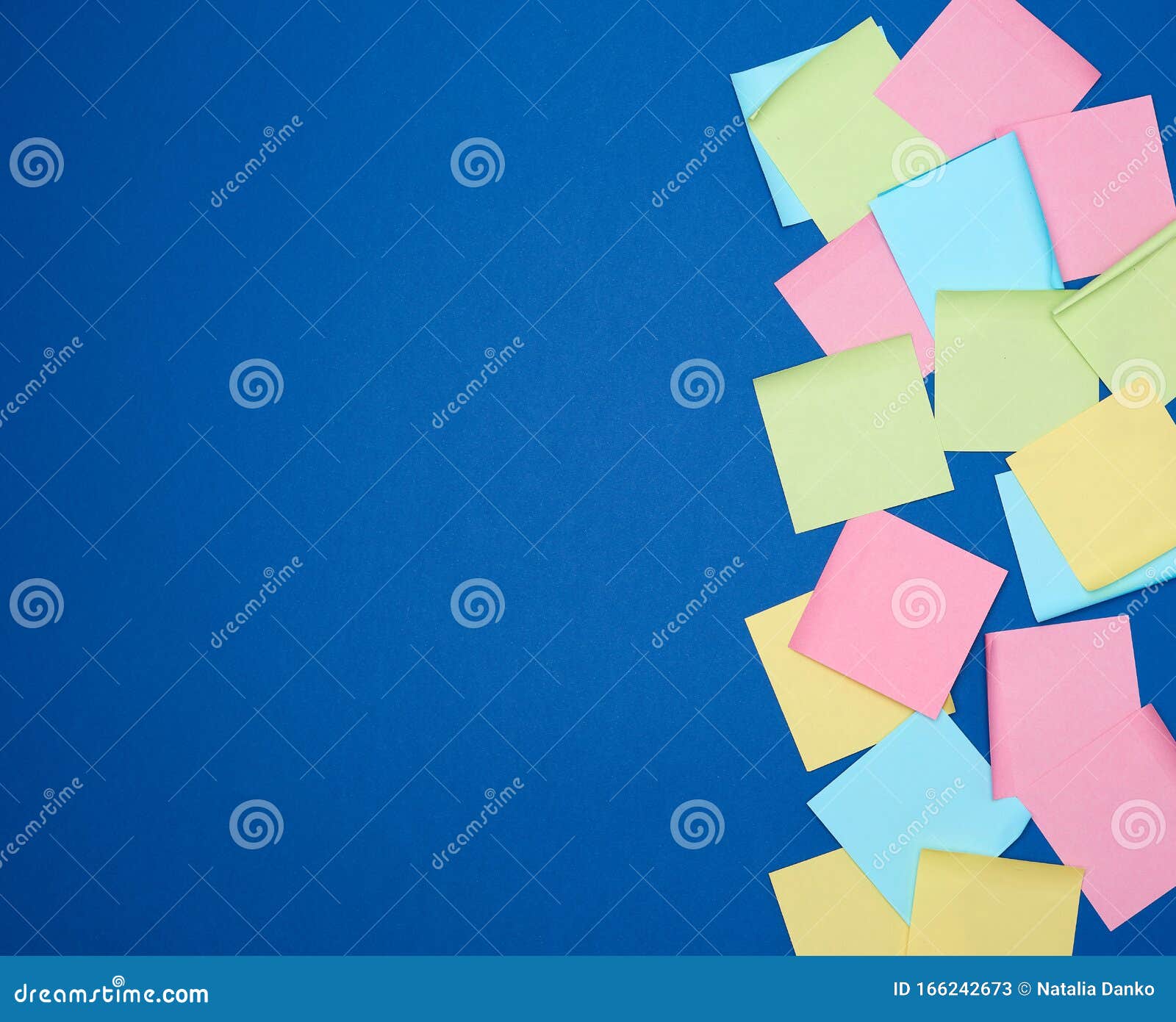 Multicolored Blank Paper Stickers of Different Colors on a Dark Blue ...