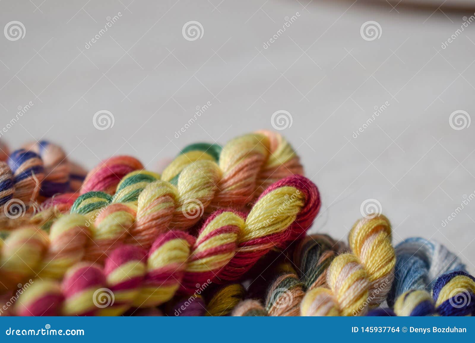Multicolored Braided Floss Threads for Embroidery. Textile Industry ...