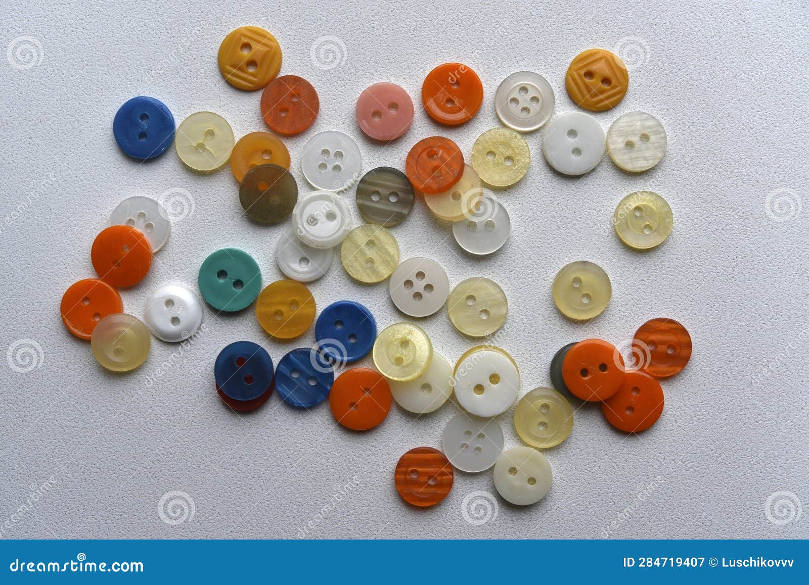 Multicolored Buttons on a White Background. Round Buttons from Clothes ...