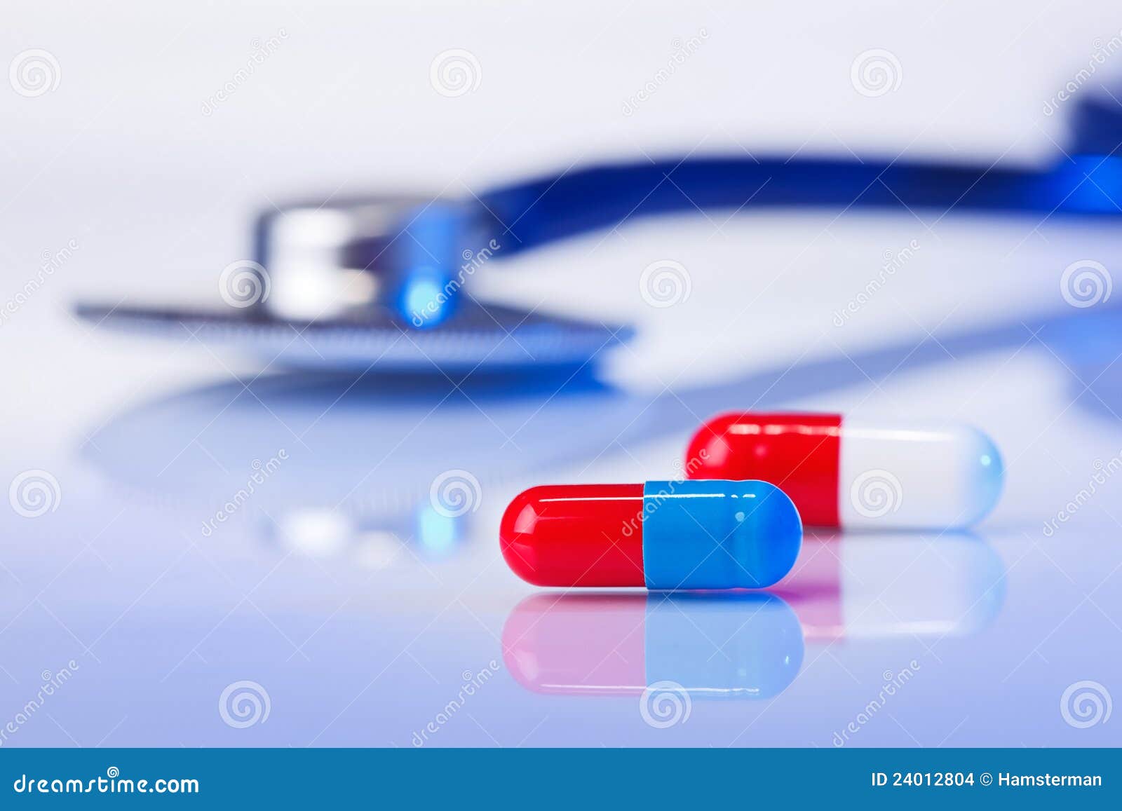 Red And Blue Bolus (capsule) In Doctor Hand Royalty-Free Stock ...