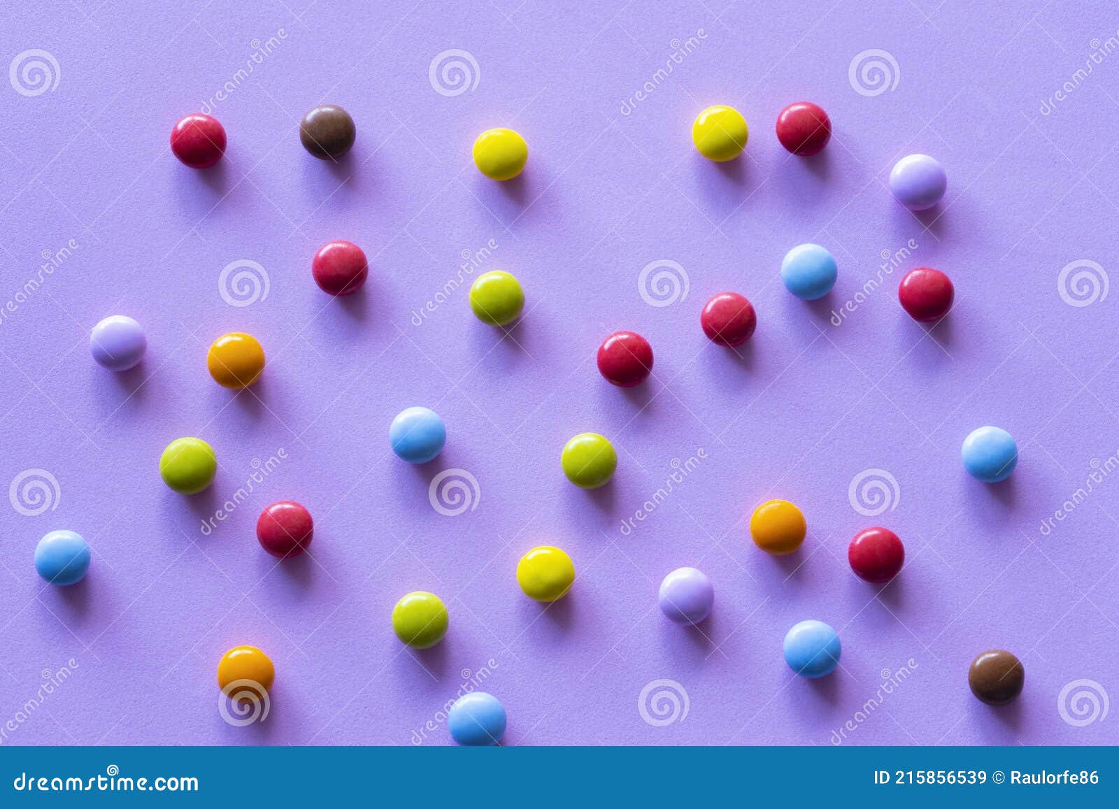 Multicolored Chocolate Candy Smarties on Purple Background Stock Image ...