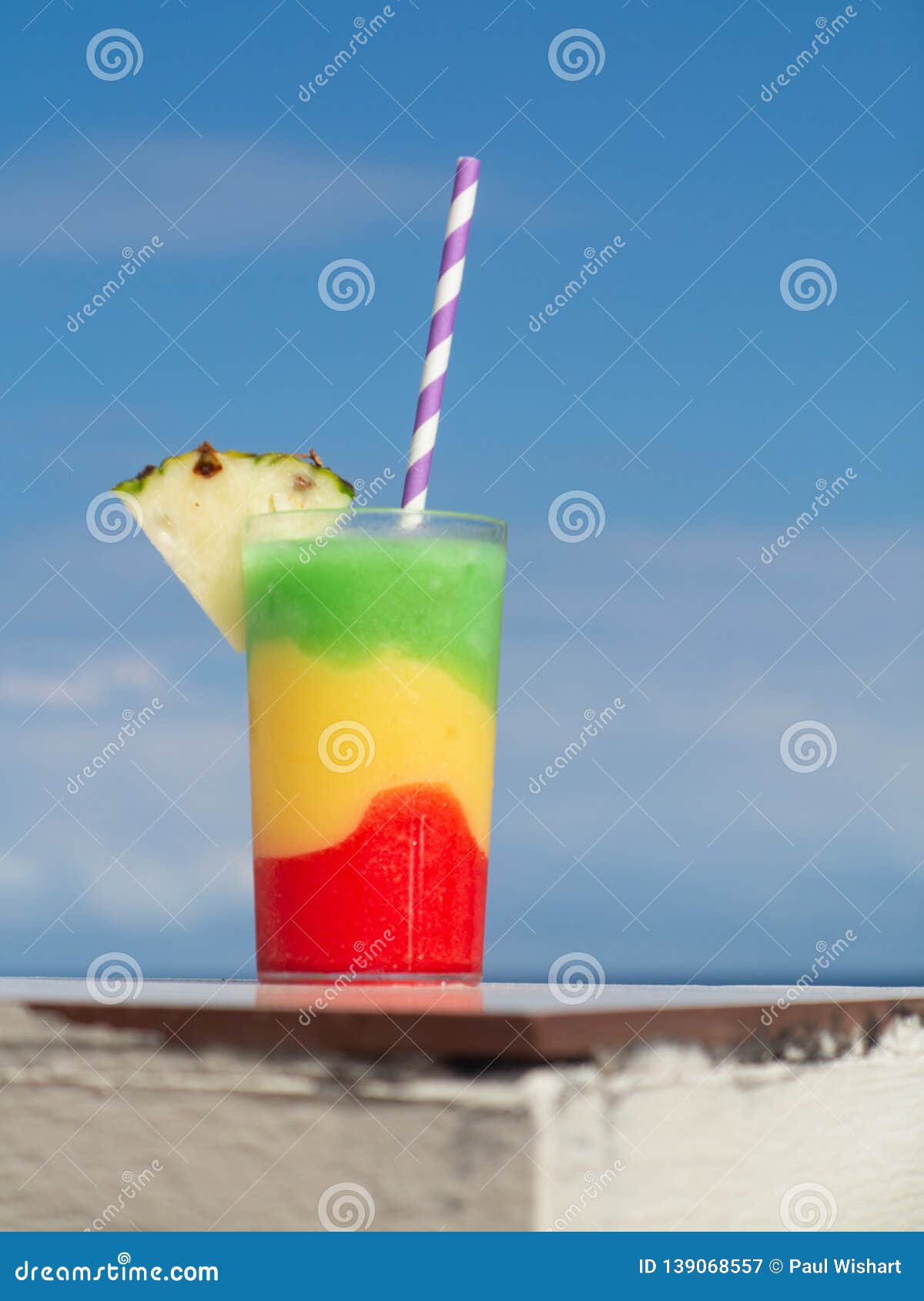 Multicolored Cocktail on Table with Blue Sky Stock Image - Image of ...