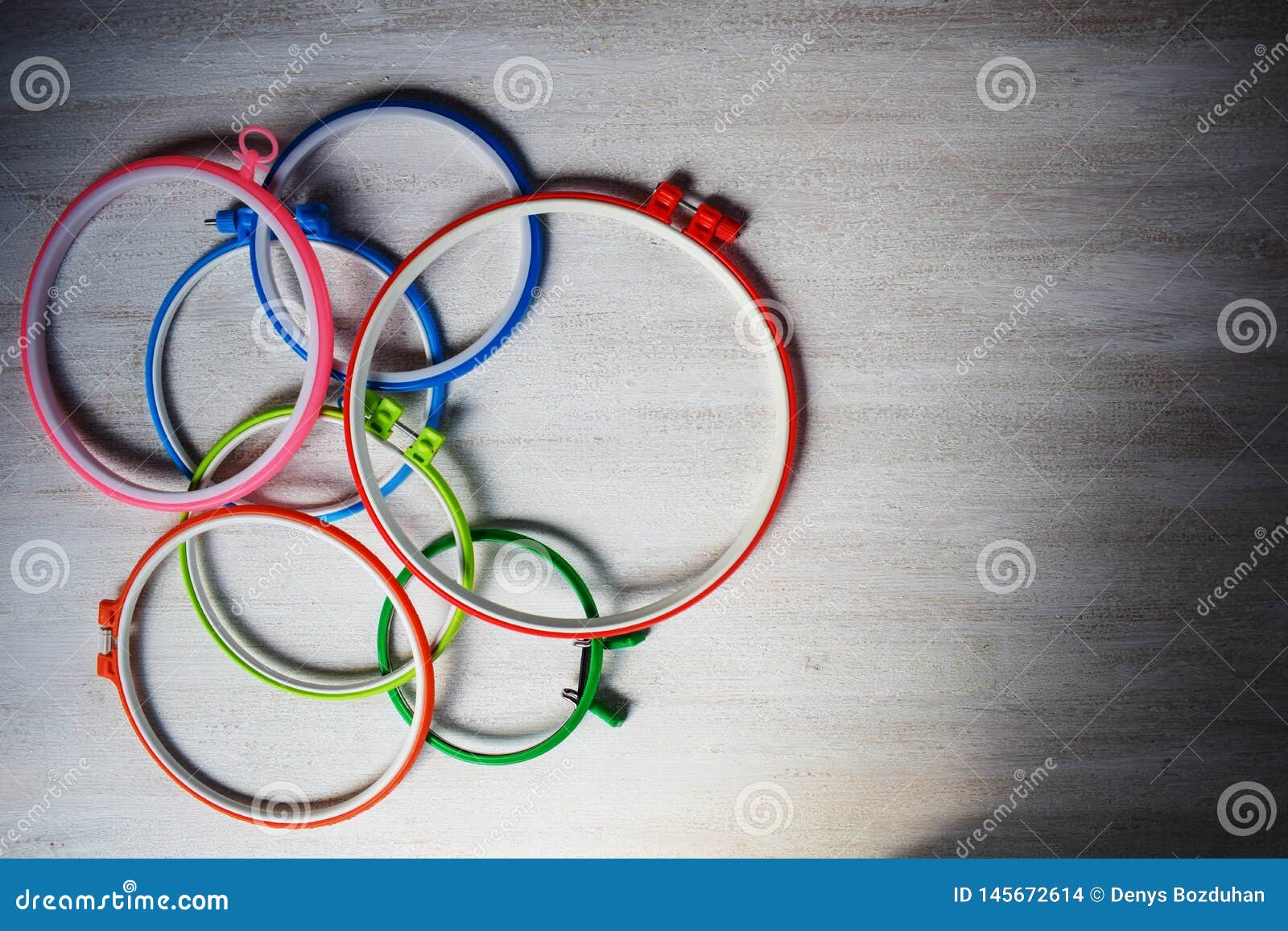 Multicolored Plastic Embroidery Hoops for Creative Art on a Light ...