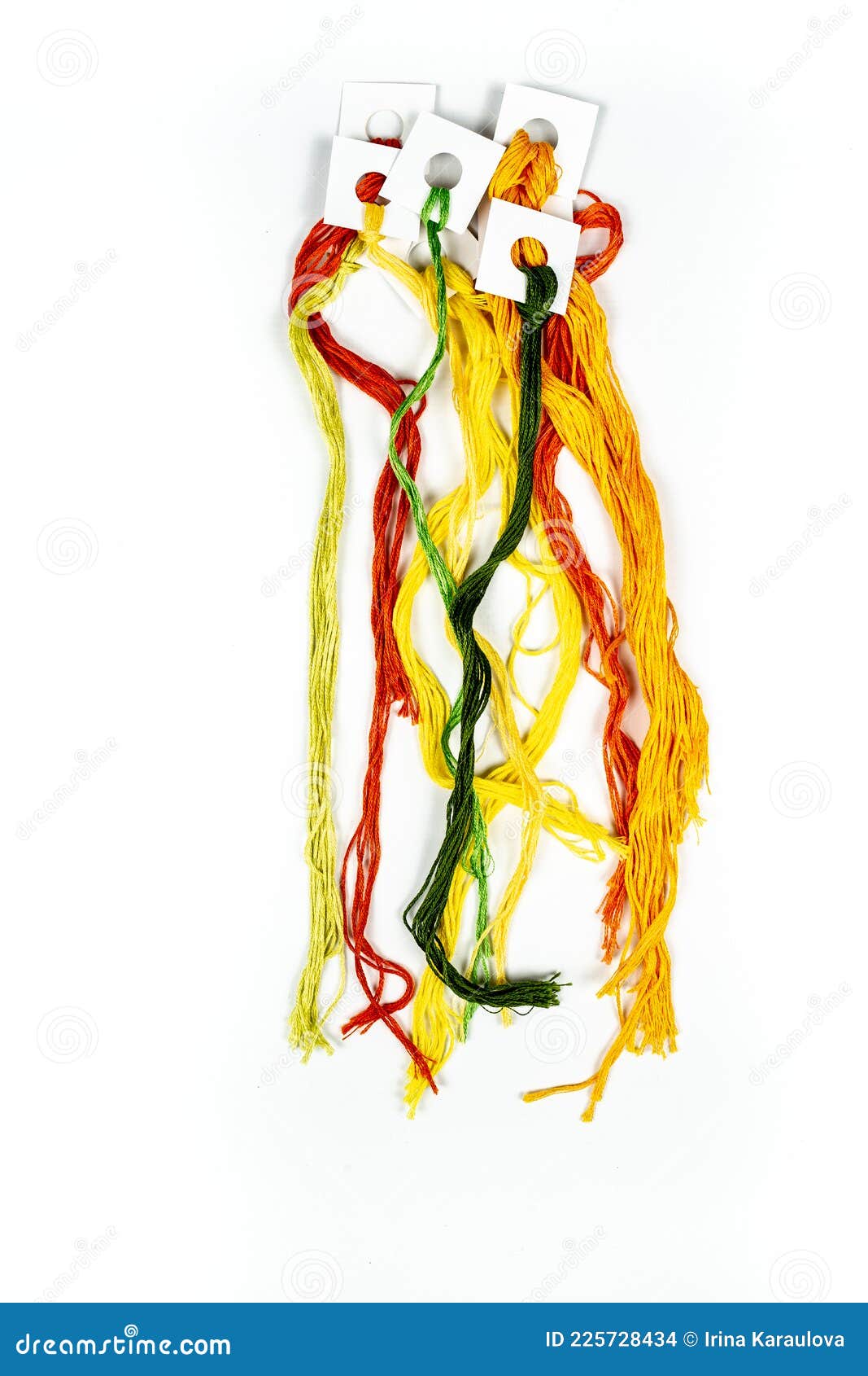 Multicolored Embroidery Threads on a White Background Stock Photo ...