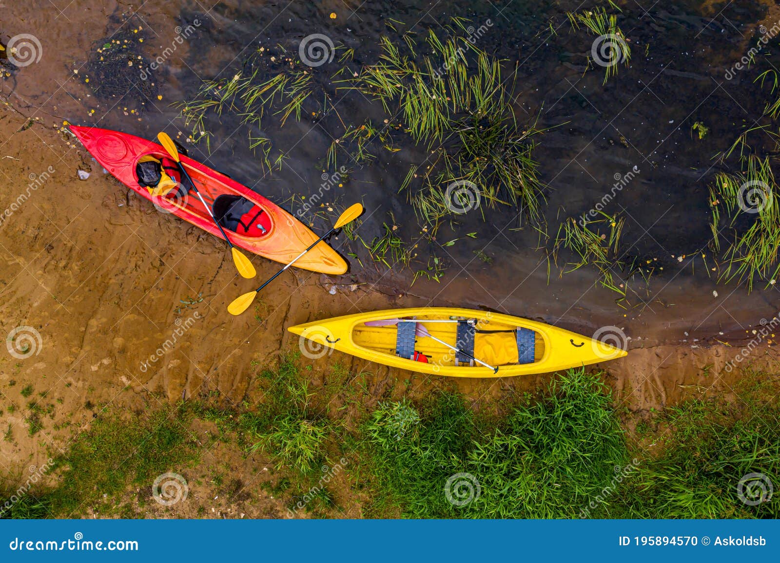 Multicolored Empty Kayaks on the River Bank, View from Above Stock ...