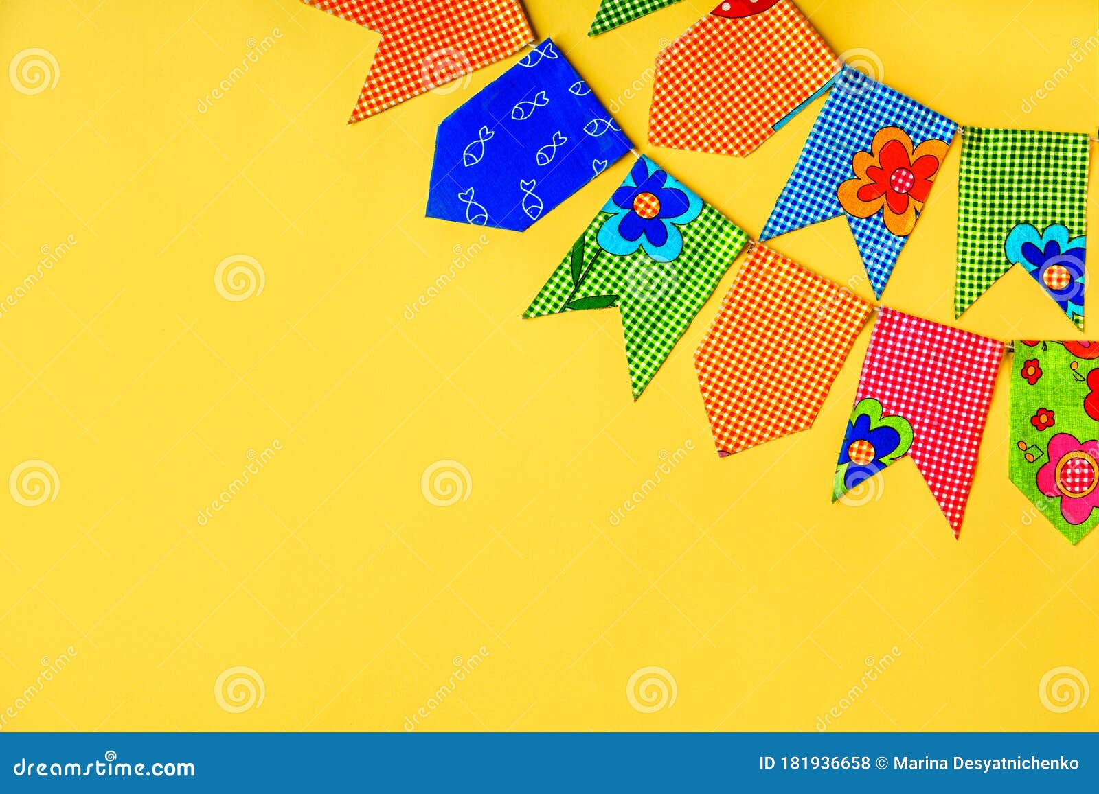 Multicolored Fabric Flags on a Yellow Background. Decorations for the ...