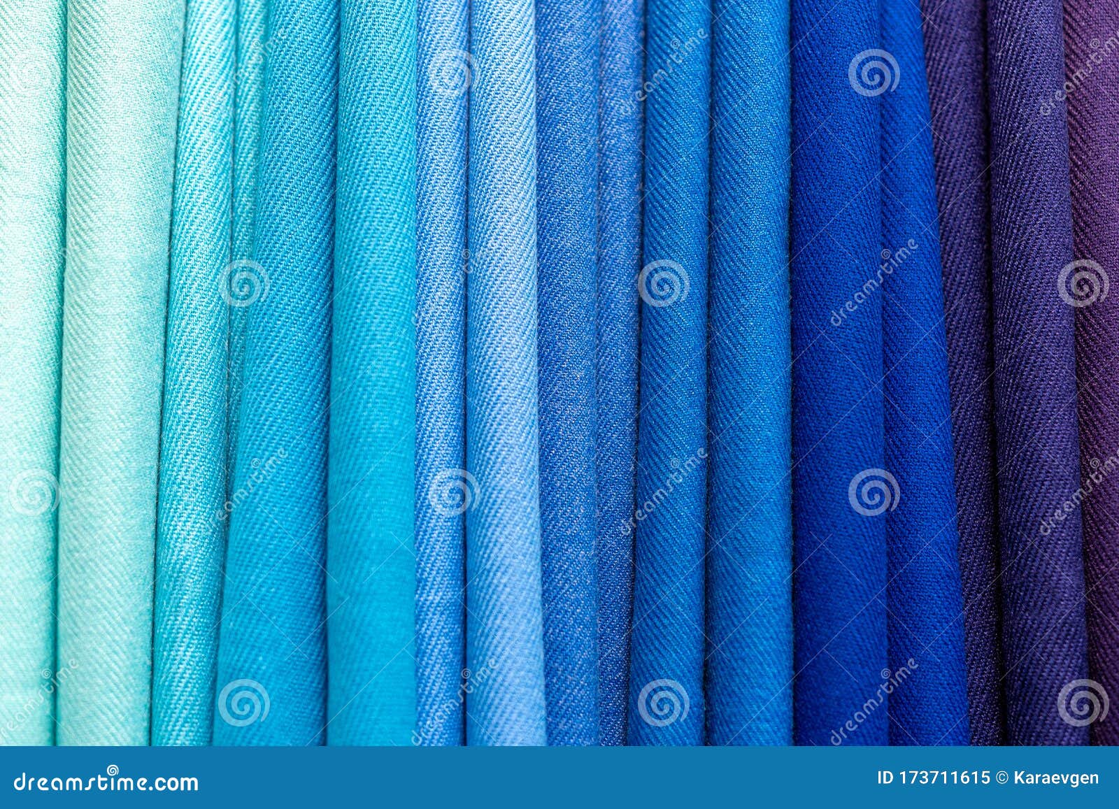 Multicolored Folded Fabric Texture. Pile of Bright Folded Fabric ...