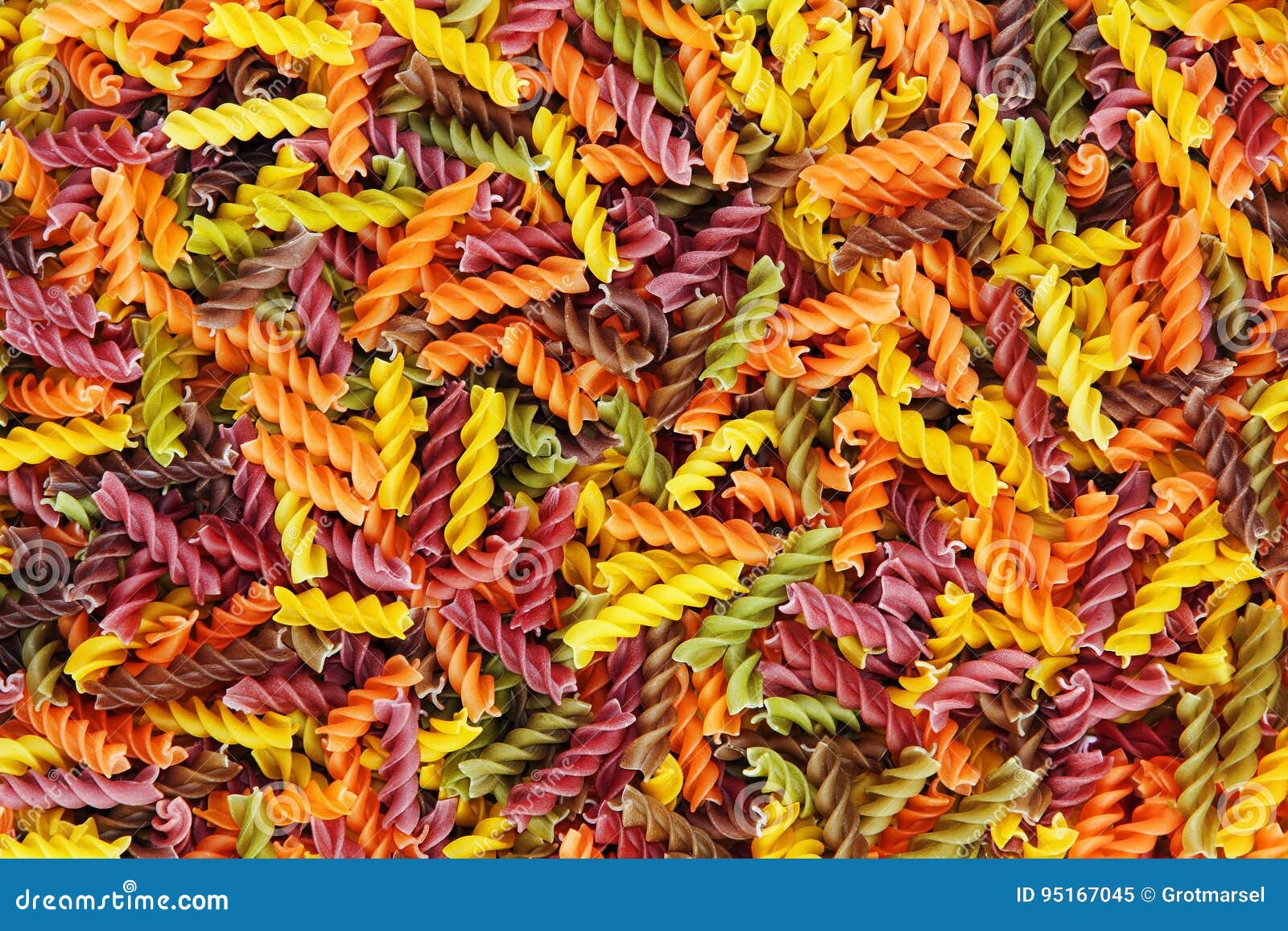 Multicolored Fusilli Raw Pasta As Food Background. Stock Image - Image ...
