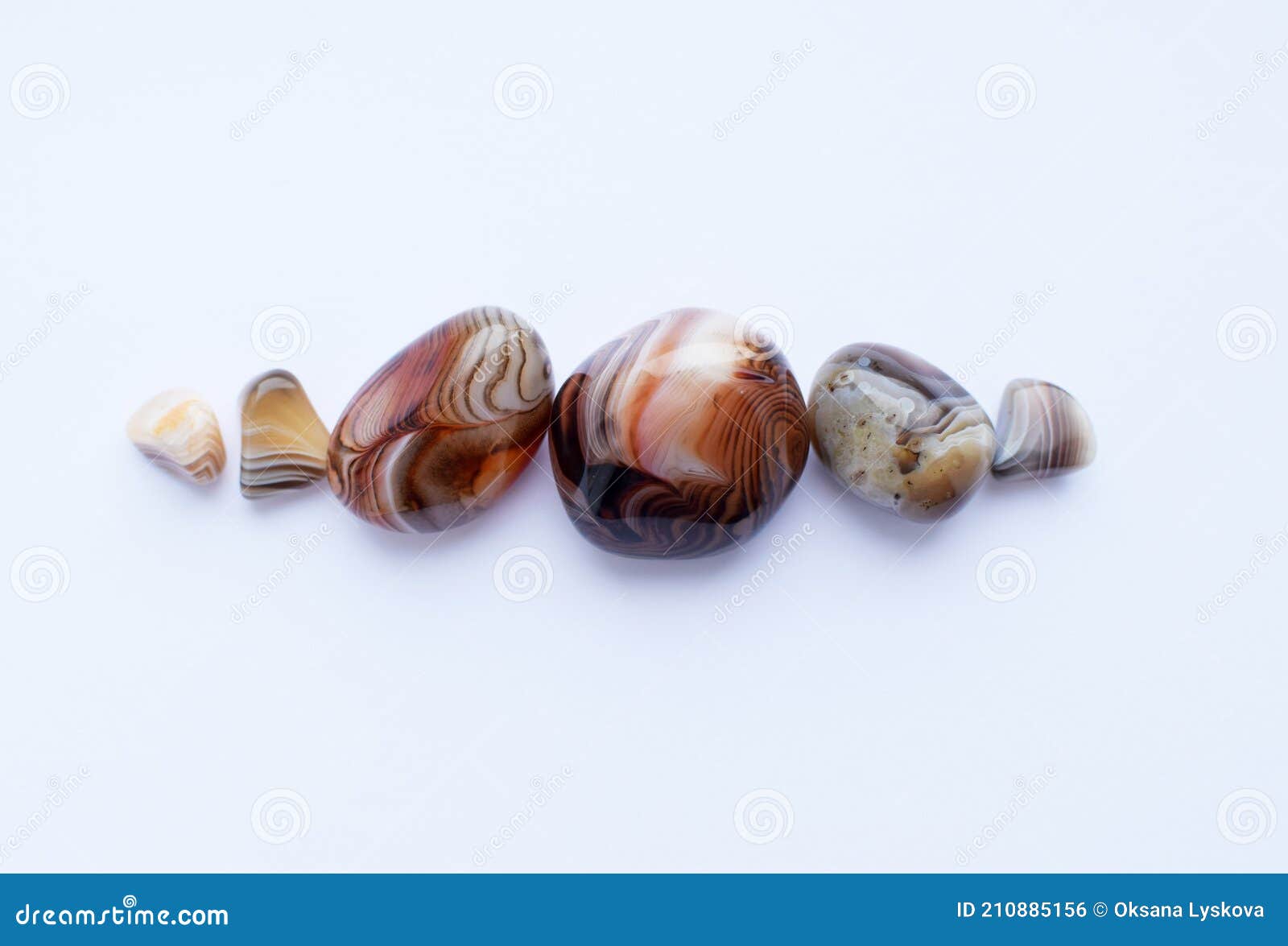 Multicolored Gemstones, Tumbled Minerals. Agates of Various Sizes Stock ...