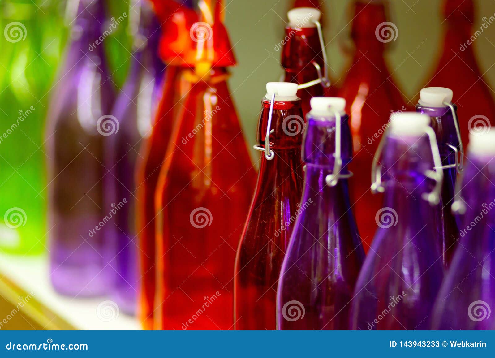 Multicolored Glass Bottles on the Shelf in the Store. Stock Image ...