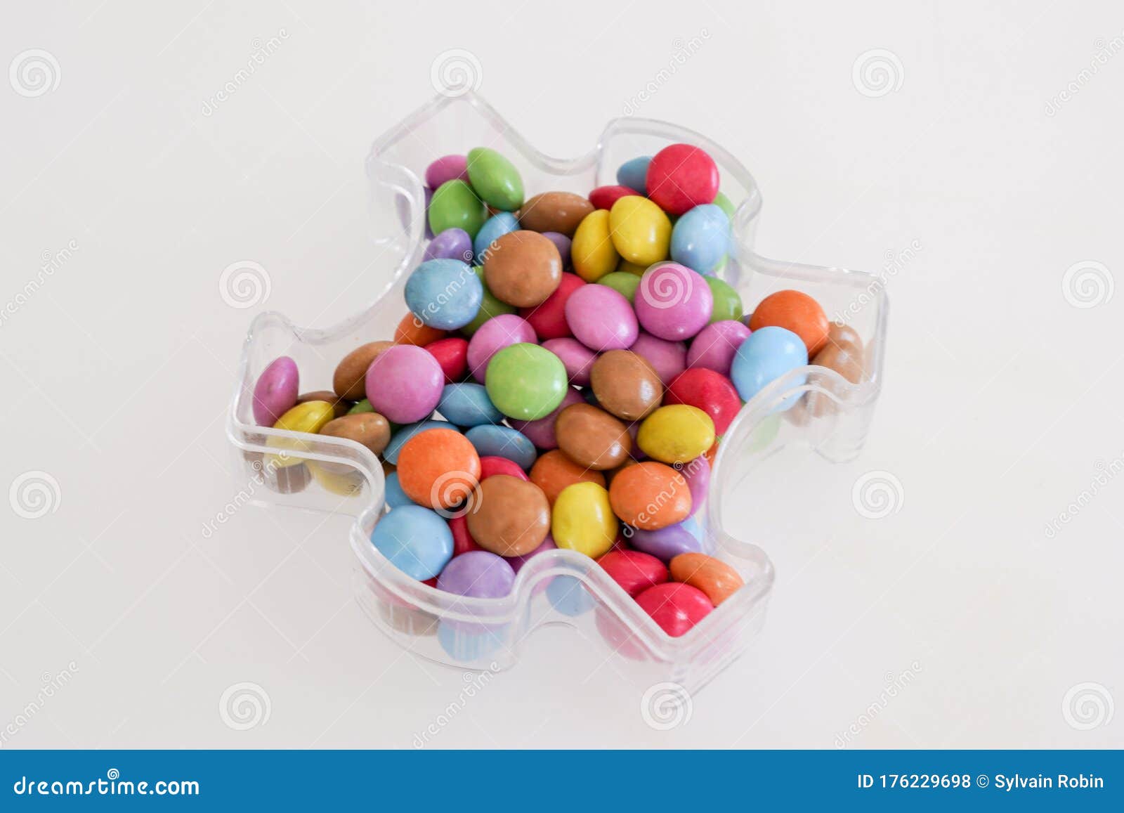 Multicolored Glazed Chocolate Candies in Plastic Box Container Stock ...