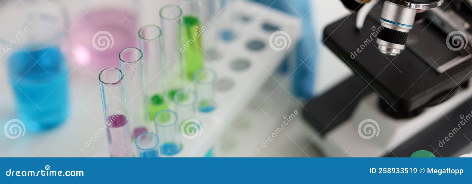 Multicolored Laboratory Test Tubes and Microscope in Laboratory Stock ...