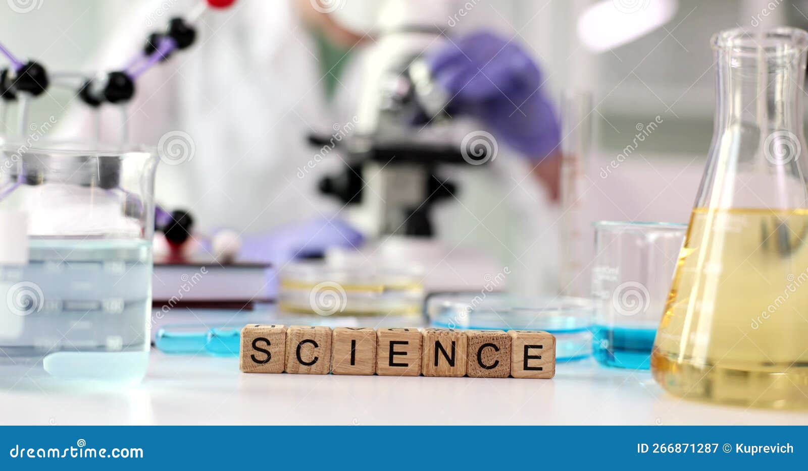 Multicolored Laboratory Test Tubes and Microscope in Laboratory Stock ...