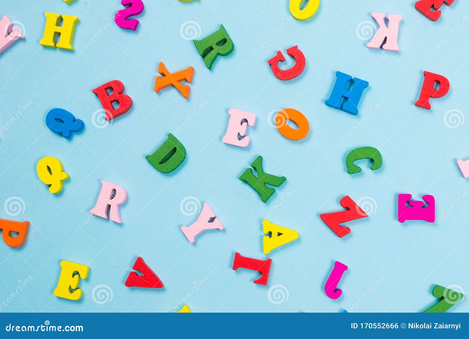 Multicolored Letters on a Blue Background Stock Photo - Image of symbol ...