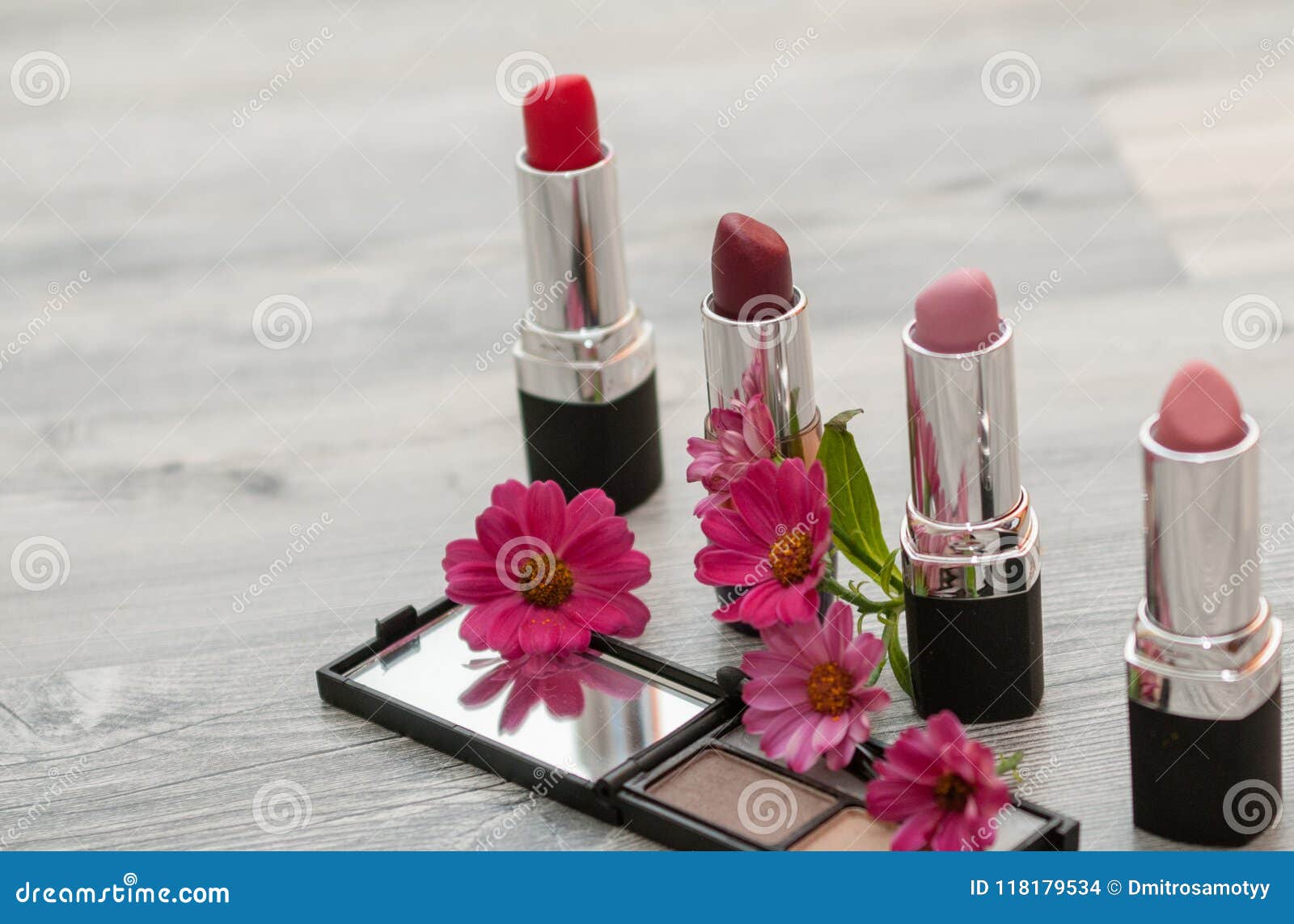 Multicolored Lipstick on a White Surface. Cosmetic Set on Light ...