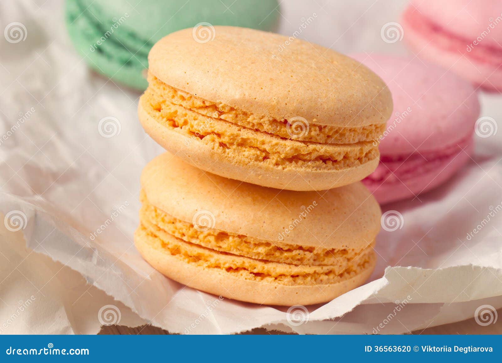 Multicolored Macaroon on Parchment Stock Photo - Image of dessert ...