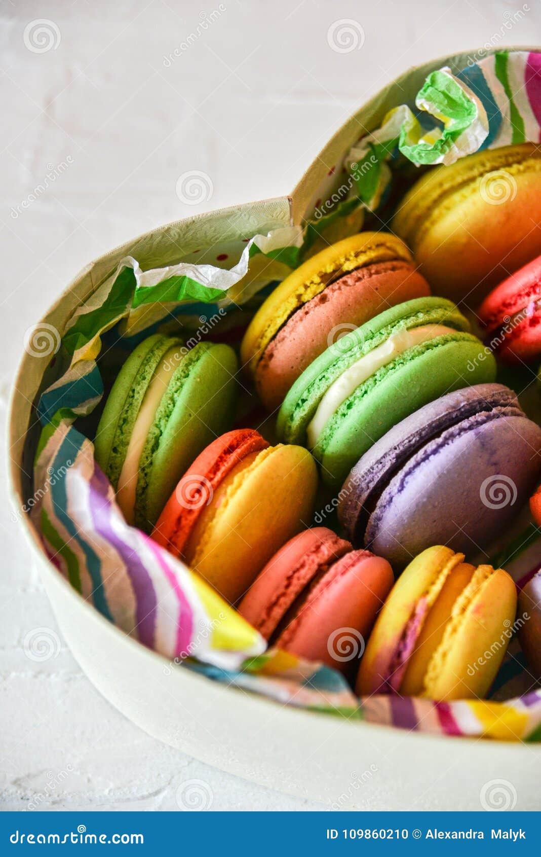 Multicolored Macaroons in a Heart Shaped Gift Box on a White Background ...