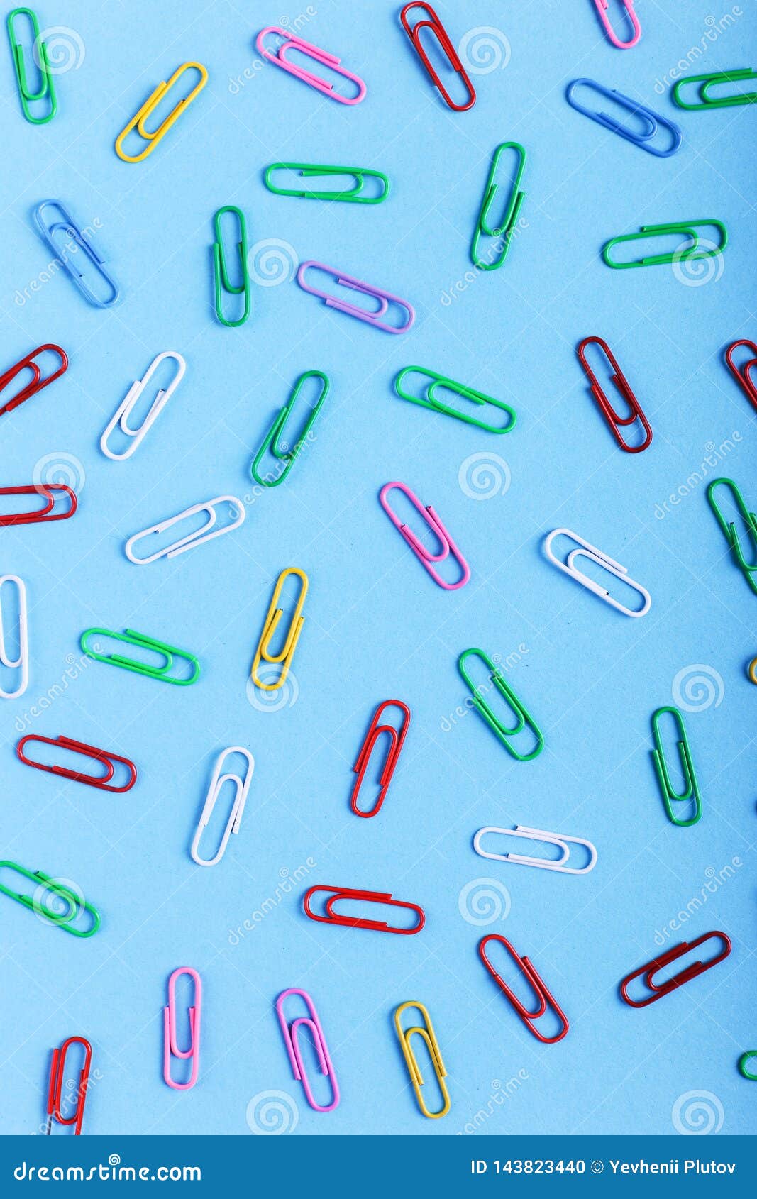 Multicolored Paper Clips on a Blue Background, Pattern, Copy Space ...