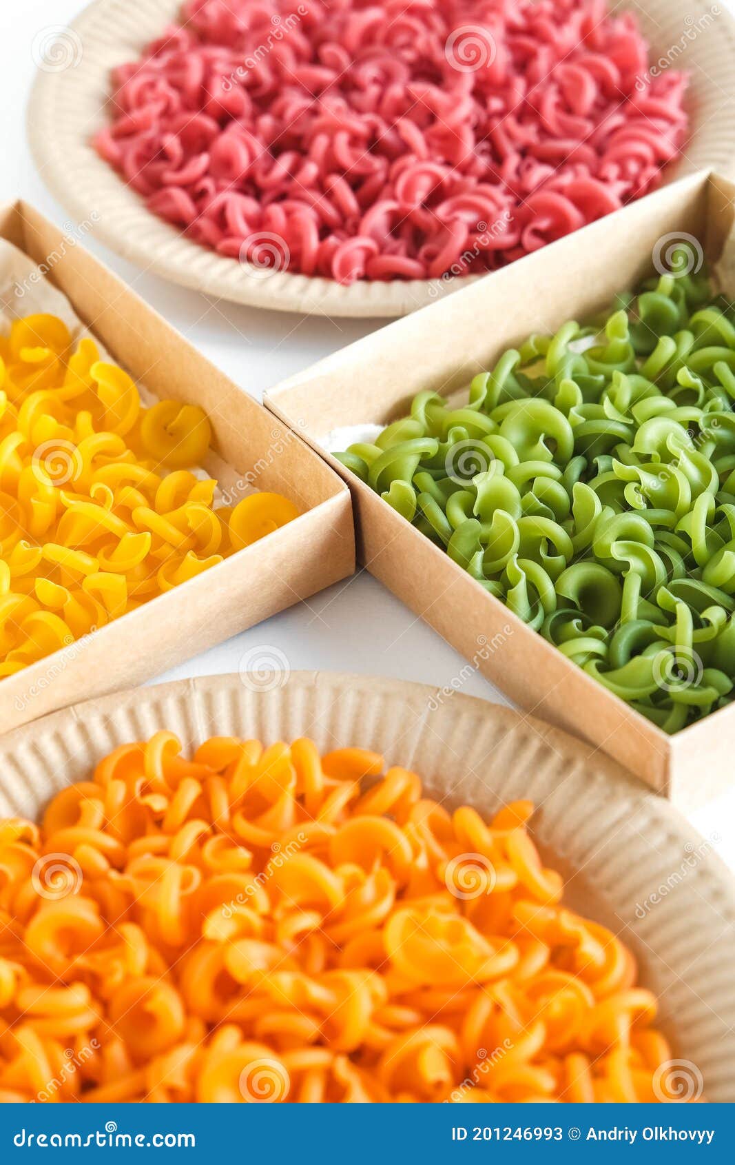Multicolored Pasta in a Disposable Kraft Paper Plates and Boxes on a ...