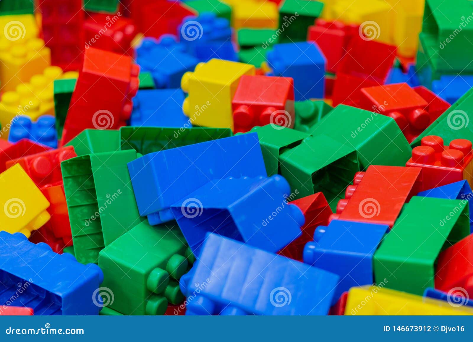 Multicolored Plastic Building Blocks. Background of Bright Plastic ...