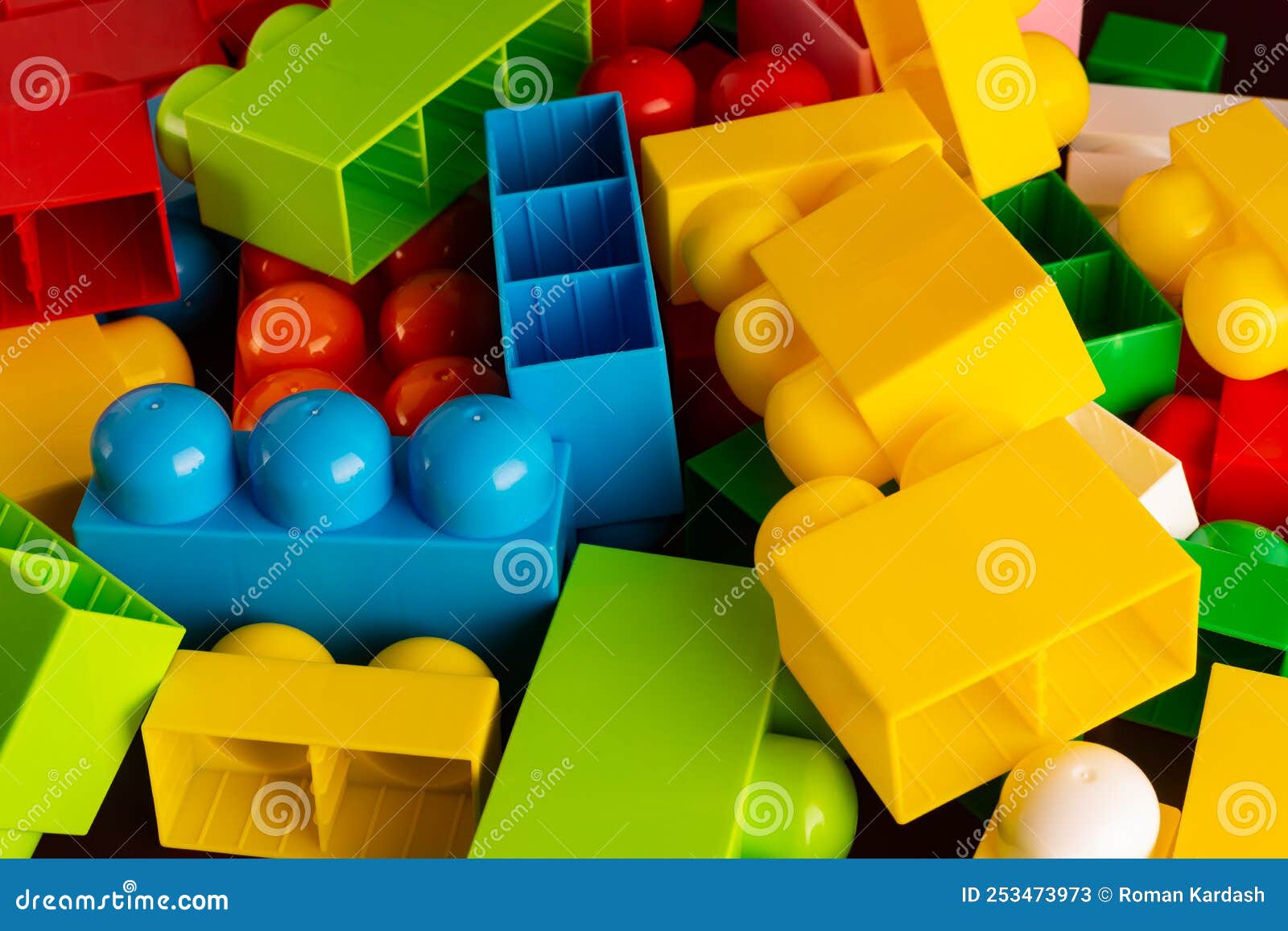 Multicolored Plastic Building Blocks of the Designer. Background of ...
