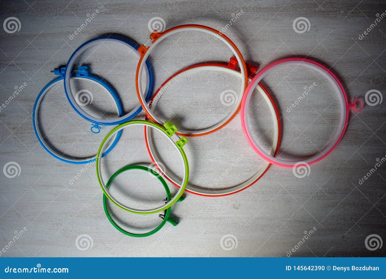 Multicolored Plastic Embroidery Hoops for Creative Art on a Light ...
