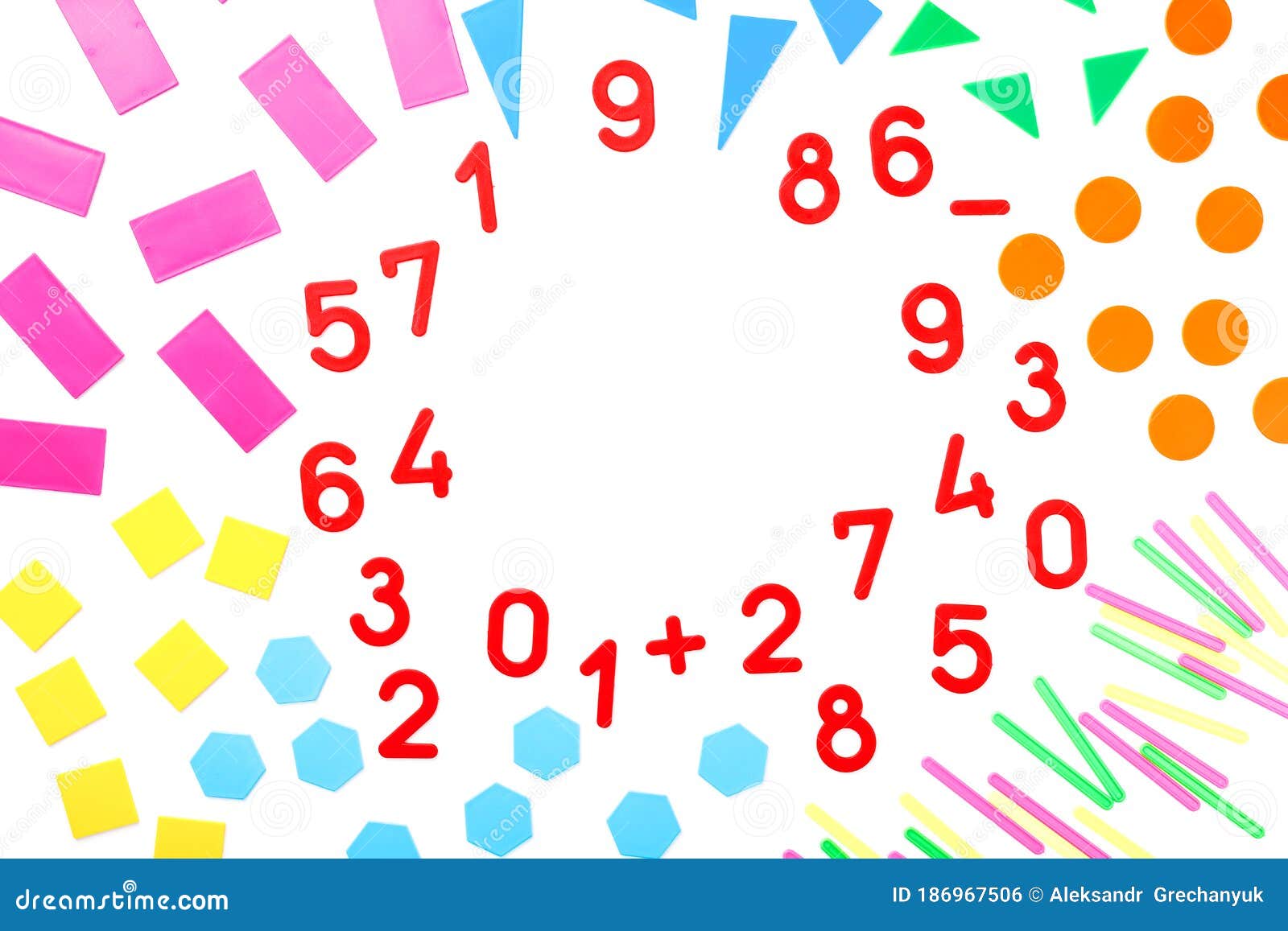 Multicolored Plastic Figures and Numbers on a White Background ...