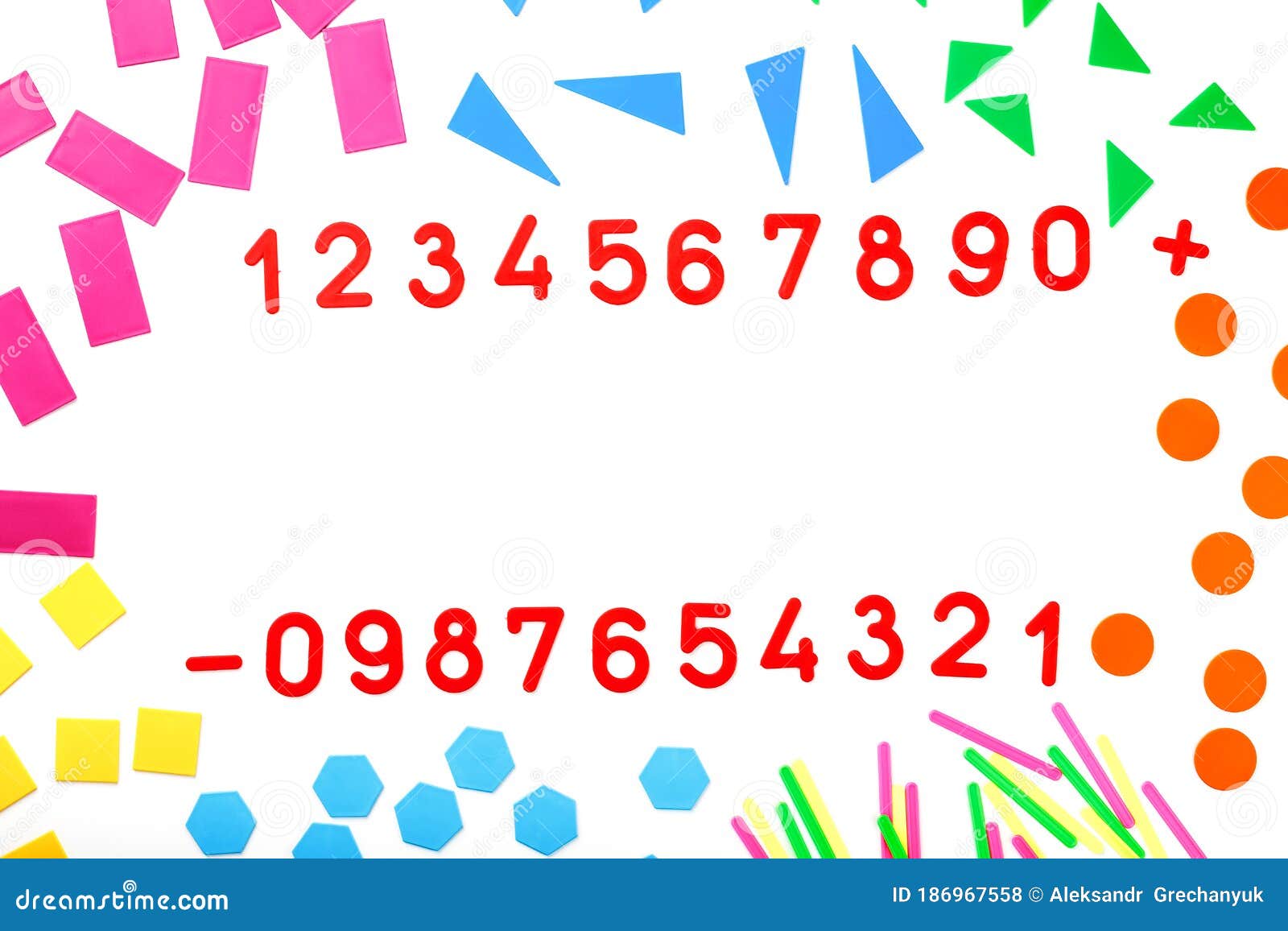 Multicolored Plastic Figures and Numbers on a White Background ...