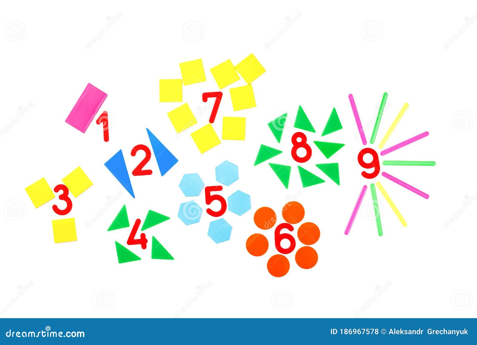 Multicolored Plastic Figures and Numbers on a White Background ...
