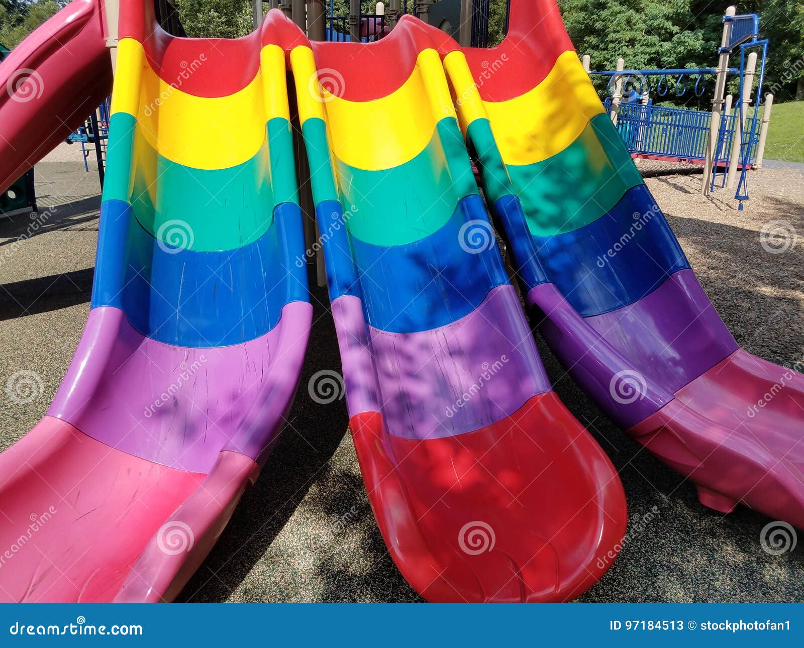 Multicolored Plastic Slides on Playground Stock Image - Image of play ...