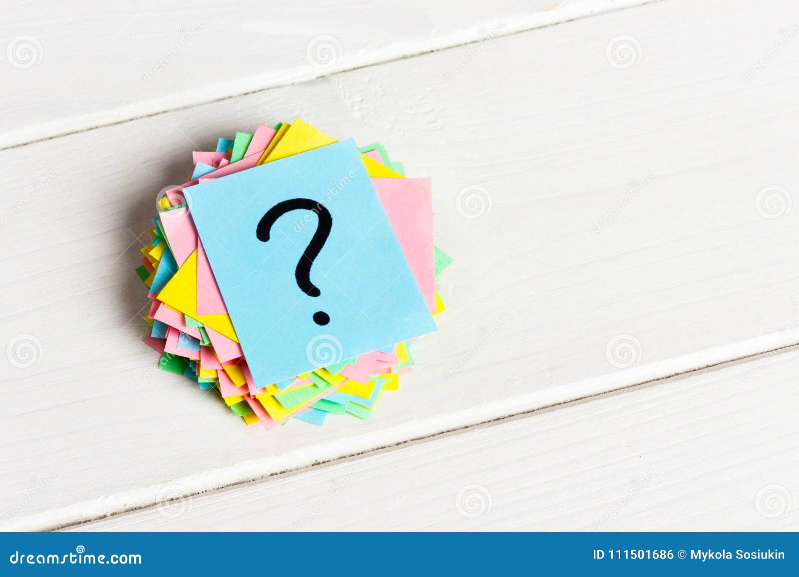 Multicolored Question Marks Written Reminders Tickets on White Wooden ... Multicolored Question Marks Written Reminders Tickets on White Wooden ...
