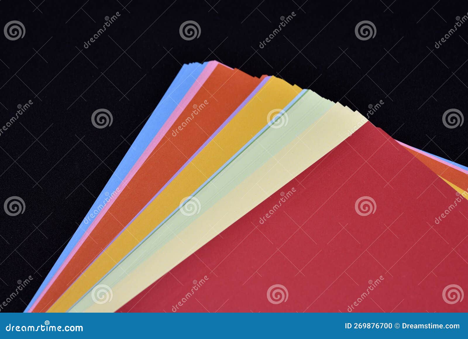 Multicolored Sheets of Paper on a Black Background. Colored Office ...