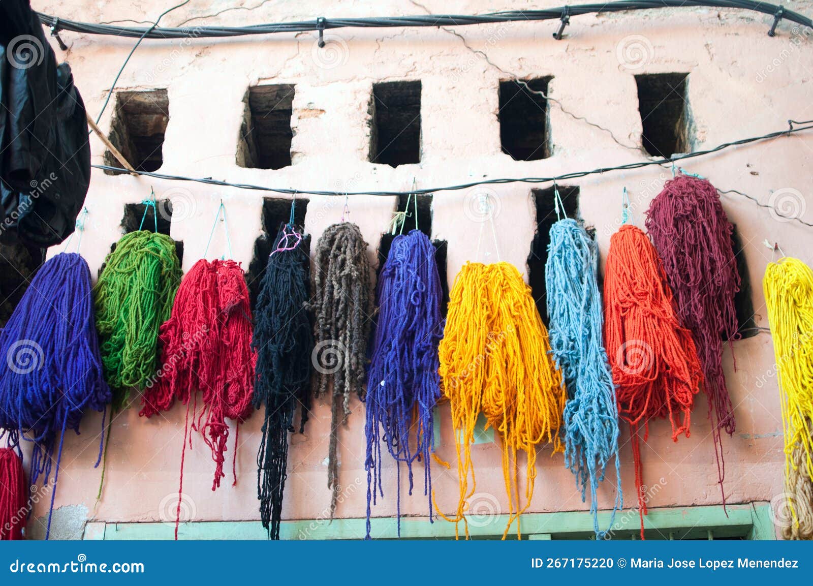 Multicolored Skeins of Wool Hanging in a Rope Stock Photo - Image of ...