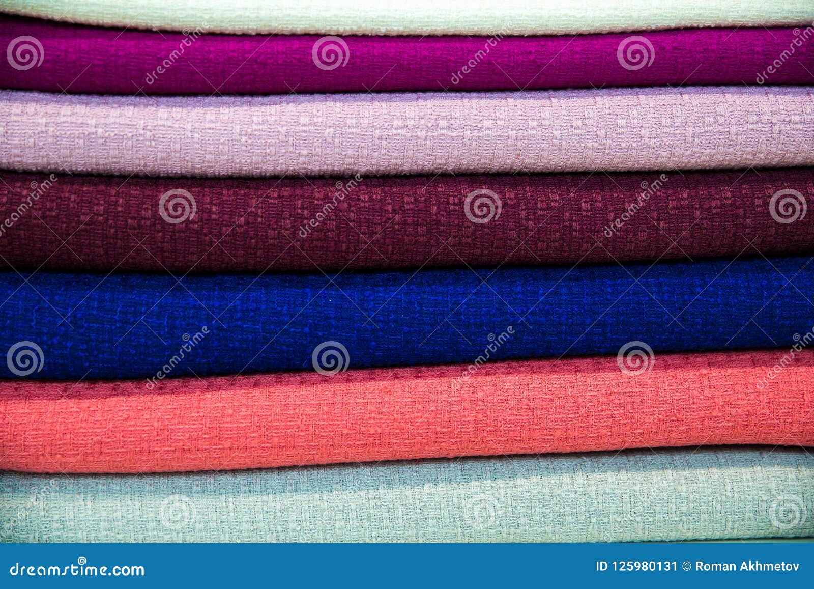A Multicolored Stack of Fabrics - the Fabrics Lie on Top of Each Other ...
